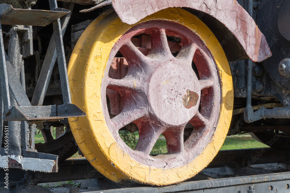 Close-up drive wheels and rods on steam engine locomotive. Vintage part ...