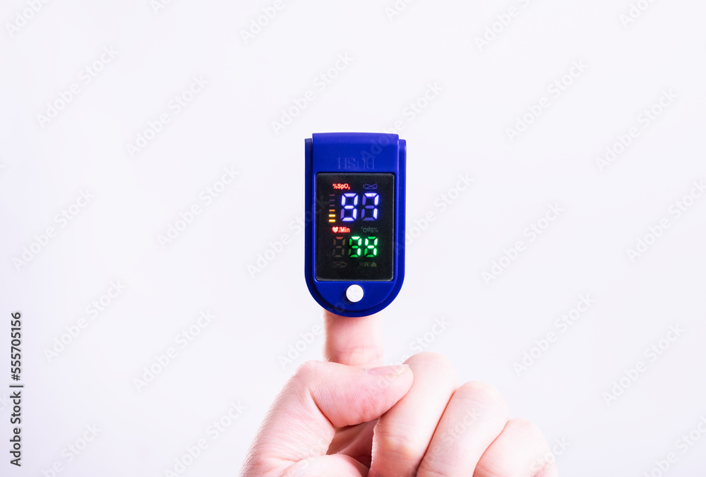Blood oxygen saturation was measured with a pulse oximeter Stock Photo ...