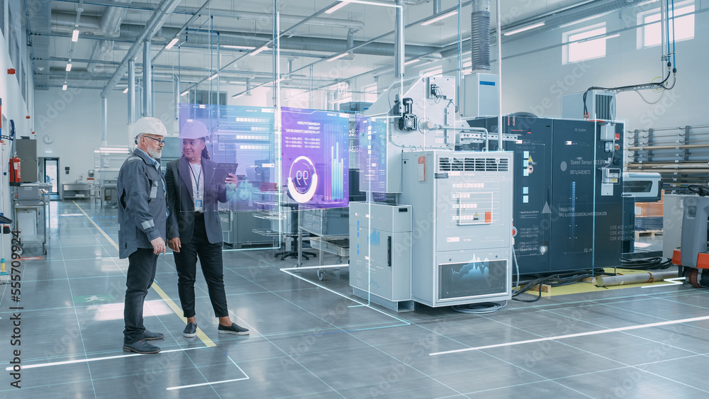 Factory Digitalization: Two Industrial Engineers Use Tablet Computer ...