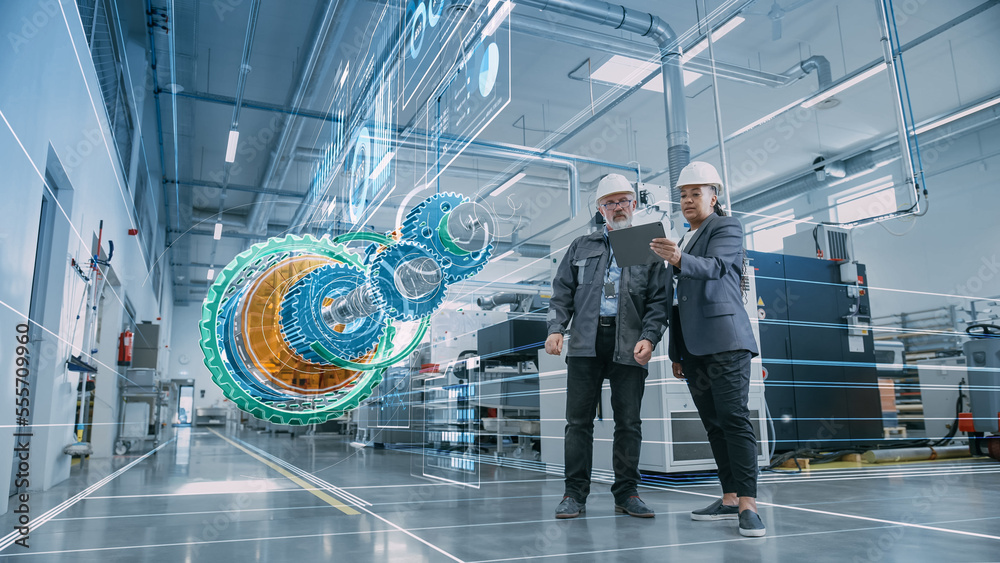 Factory Digitalization: Two Industrial Engineers Use Tablet Computer ...