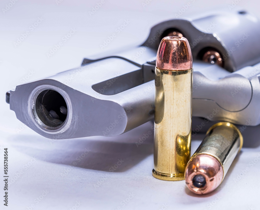 The muzzle of a 454 casull snub nose revolver loaded with hollow point ...