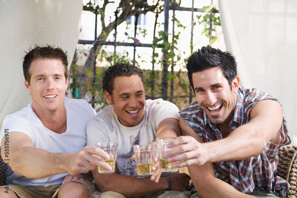 Men at a Party Stock Photo | Adobe Stock