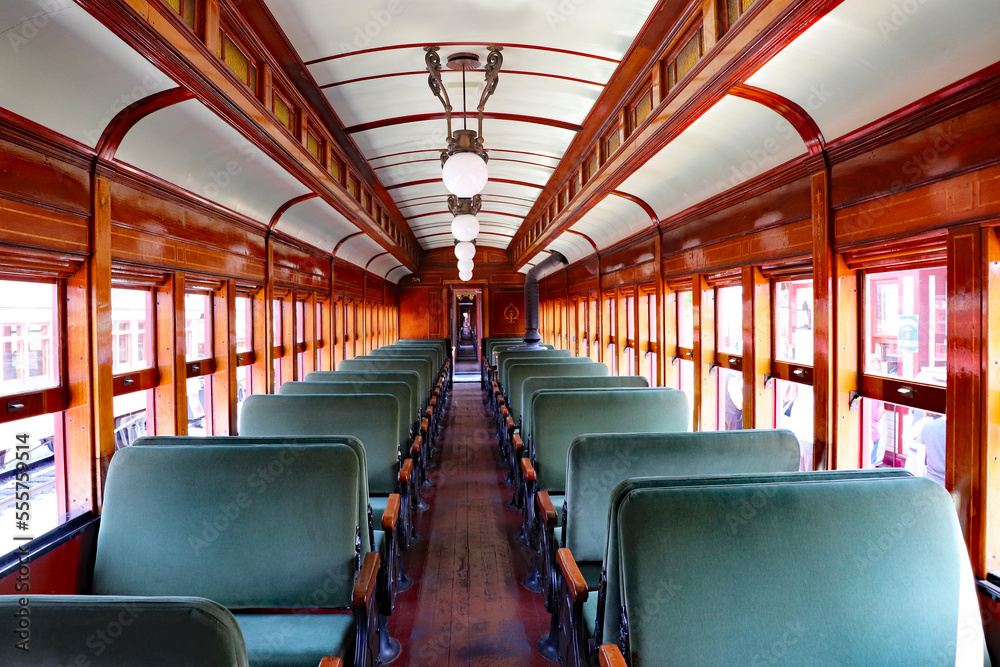 Inside view with two rows of seats in a restored pullman railroad car Stock Photo | Adobe Stock