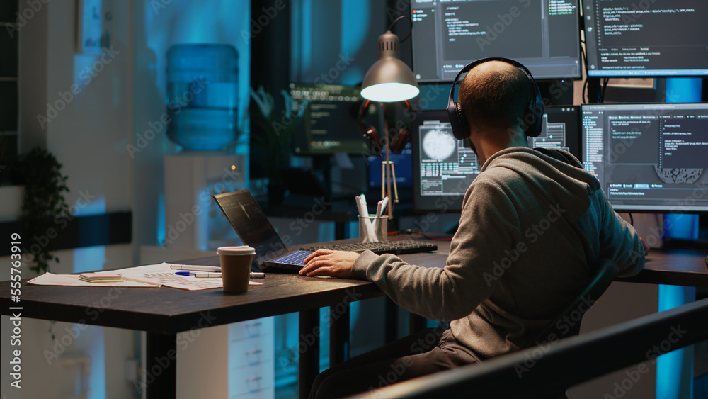 Software Engineer Typing Programming Code On Laptop With Multiple Monitors Working With Html