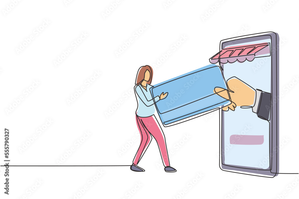 Continuous one line drawing young female inserting credit card into ...