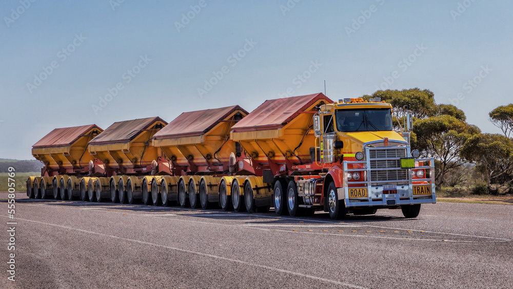 Super Quad Road Train (with 4 trailers) driving on the highway Stock ...
