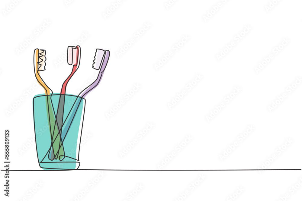 Single continuous line drawing several toothbrushes in glass. Dental ...