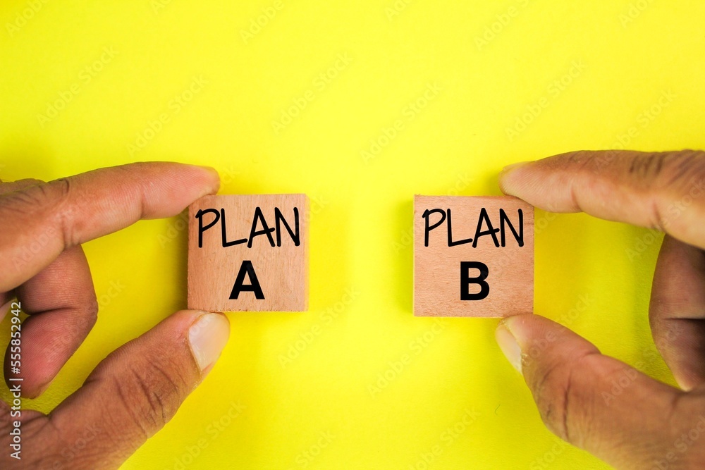 hand holding plan A and B. concept of plan selection. Business plan ...