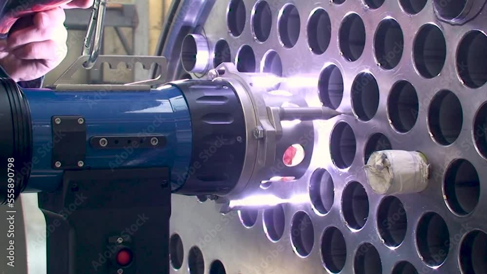 Welding shell and tube in tube heat exchanger. Welding head equipment ...