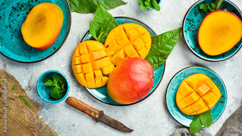 Fresh sliced mangoes. Famous Alphonso mango. Top view on a rustic ...