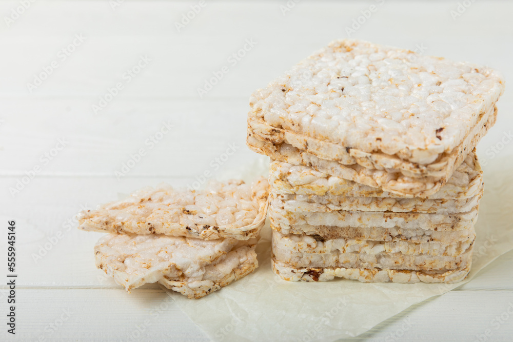 Rice cakes on white texture wood. Close-up. Healthy food. Diet food ...