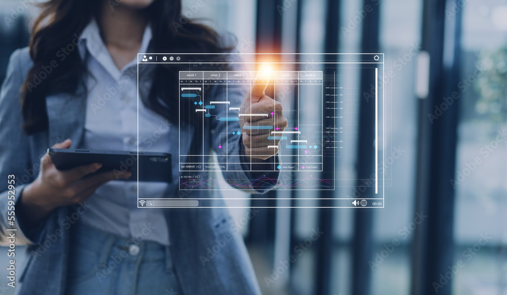 Analyst working with computer in Business Analytics and Data Management ...