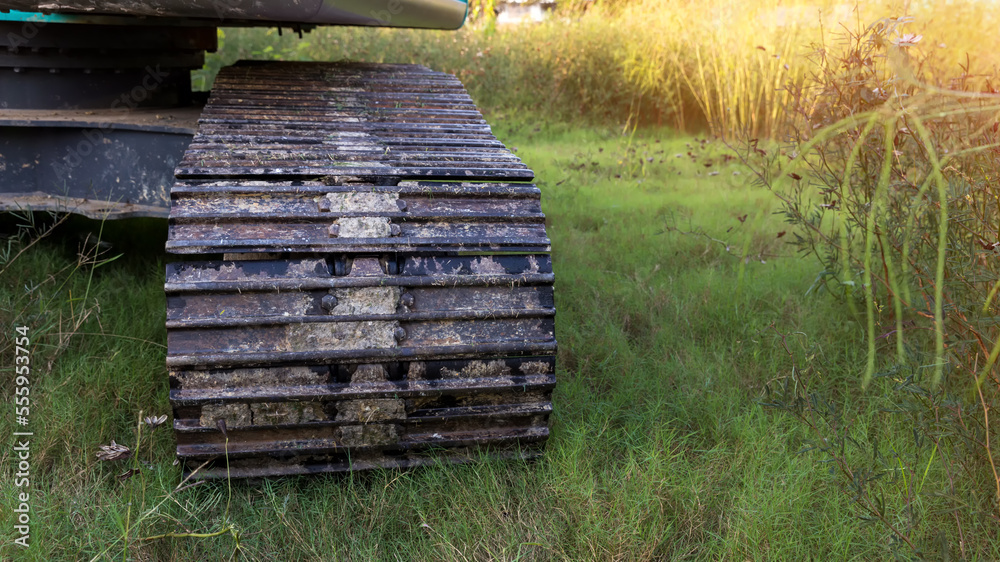 Excavator tracks. Old iron caterpillars of the bulldozer of the tractor ...