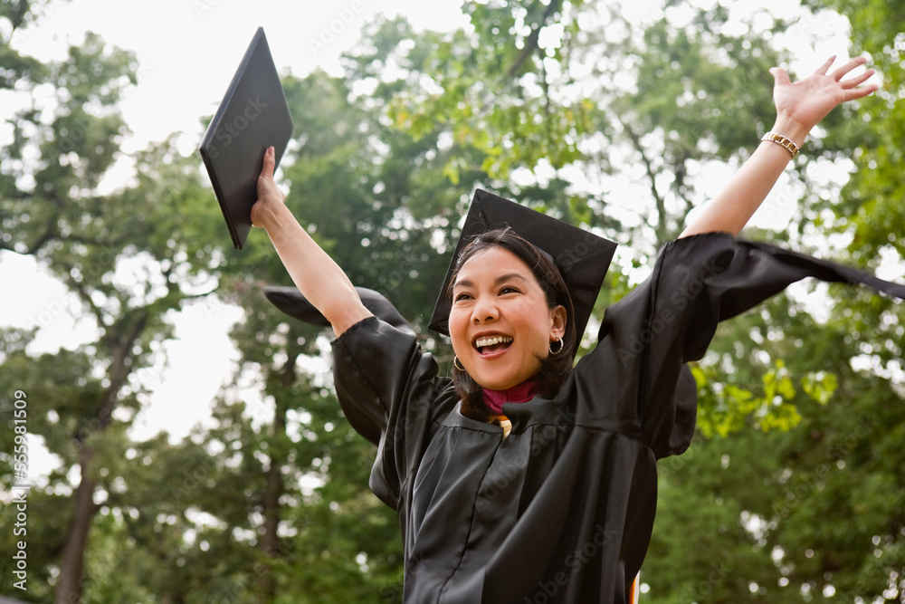 Excited Graduate Cheering Stock Photo | Adobe Stock