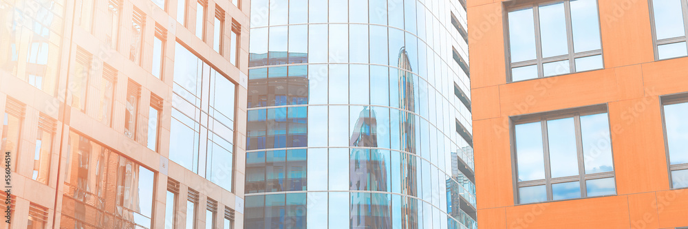 Modern high-rise office buildings with facades of glass and metal. Wide ...