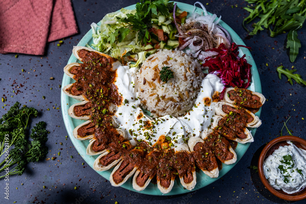 turkish beyti kebab with rice and salad Stock Photo | Adobe Stock
