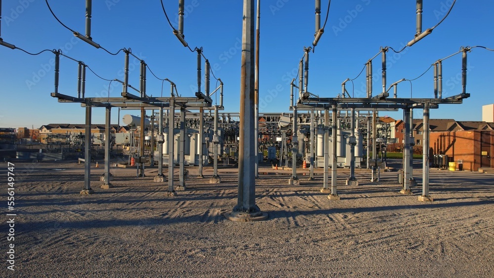 High voltage substation with pylons and distribution cables ...