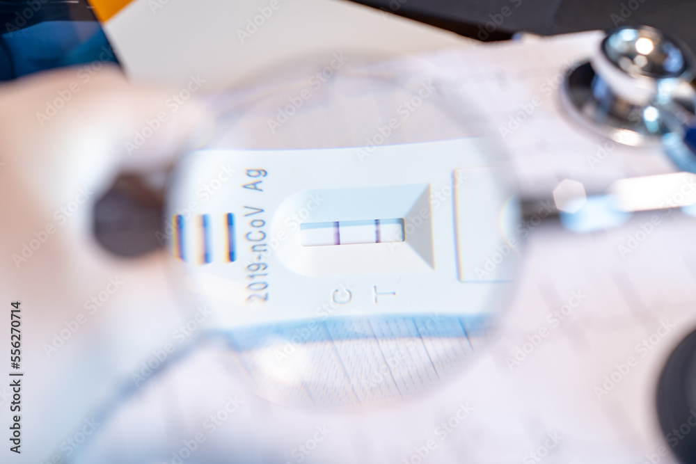 Stack of positive COVID-19 NHS rapid home lateral flow tests,Positive ...