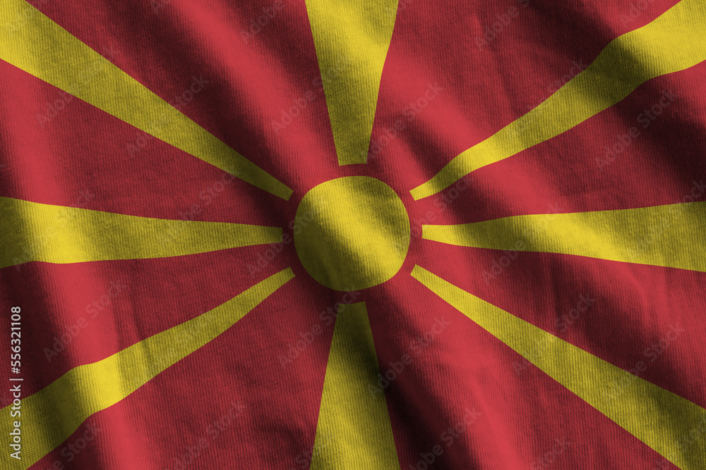 Macedonia flag with big folds waving close up under the studio light ...