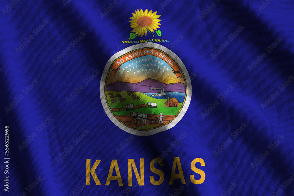 Kansas US state flag with big folds waving close up under the studio ...