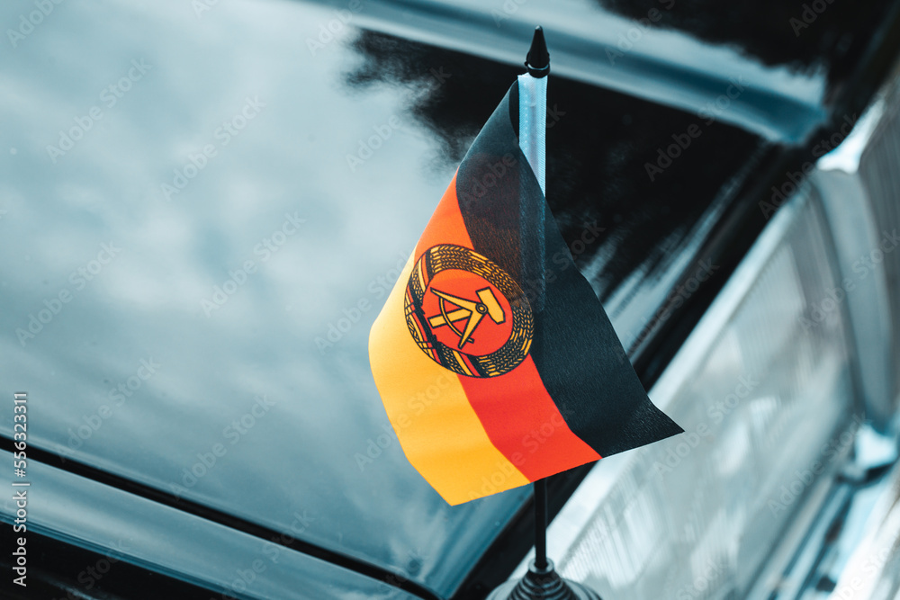 former DDR flag, democratic republic of germany, black car, communist ...