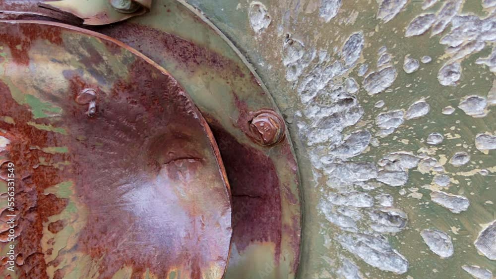 Hole or hole, armor deformation from a projectile close-up. Damaged ...