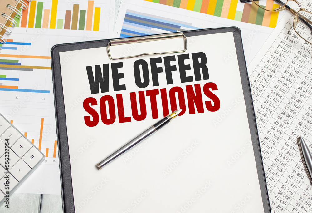 We offer solutions . Conceptual background with chart ,papers and pen ...