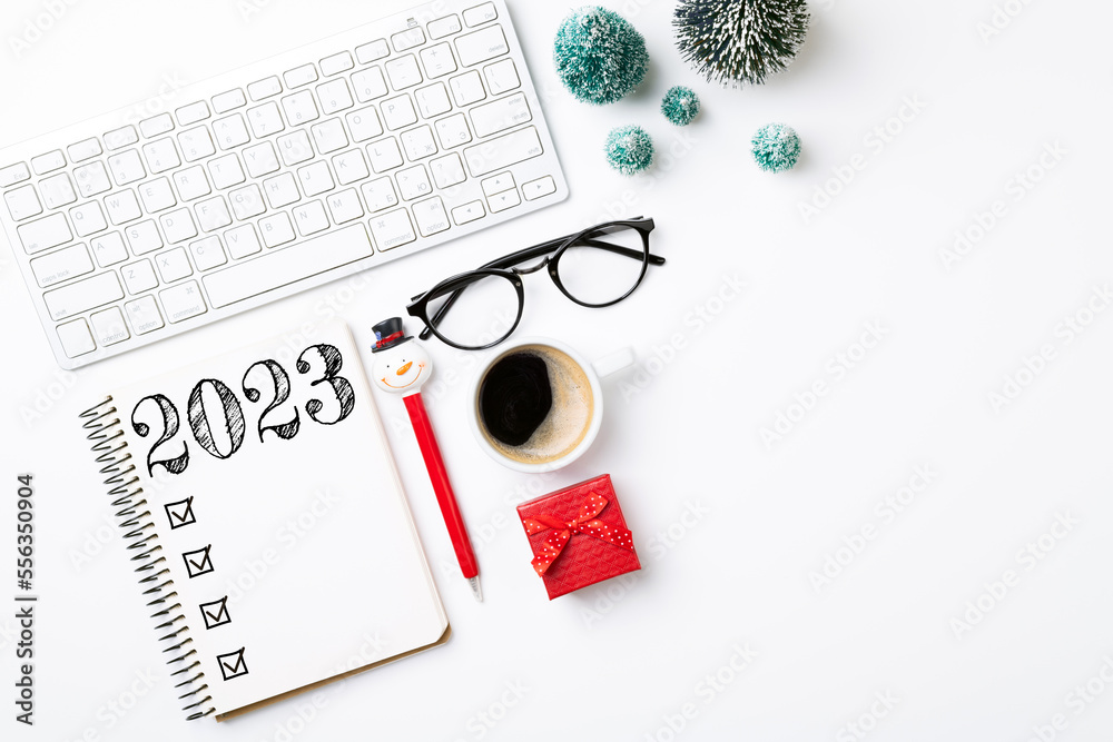 New year resolutions 2023 on desk. 2023 resolutions list with notebook ...