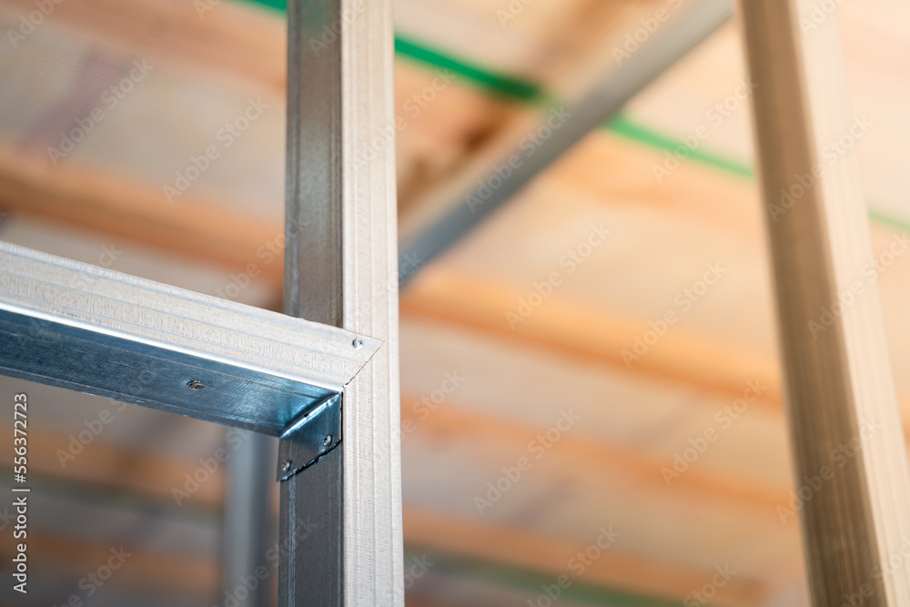 Stiffening ribs in a metal profile frame in a plasterboard wall close ...