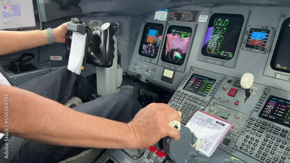 Inner cockpit view during a real flight. Flying the Captain. Daylight ...