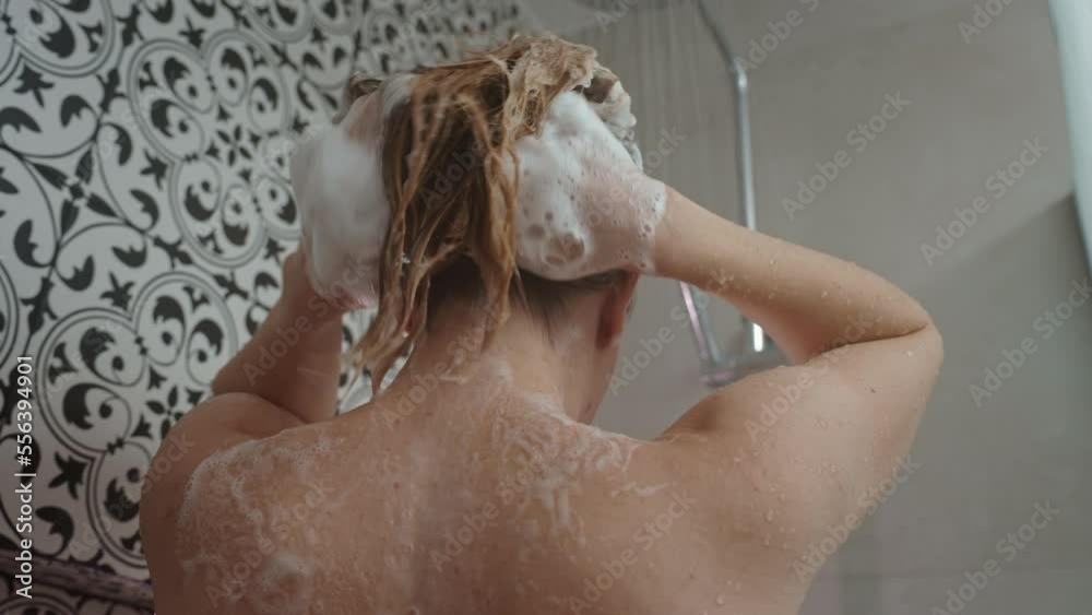 Back View Of Naked Woman Taking Shower In Shower Stall Woman Washing