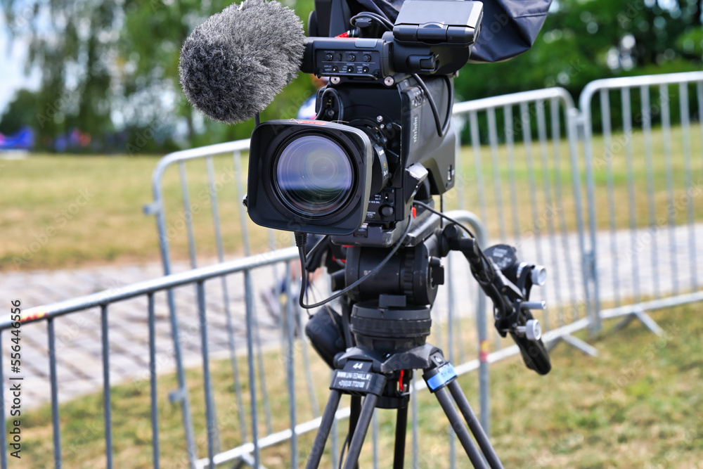 video camera on a tripod , playback, objective, tripod, optic ...