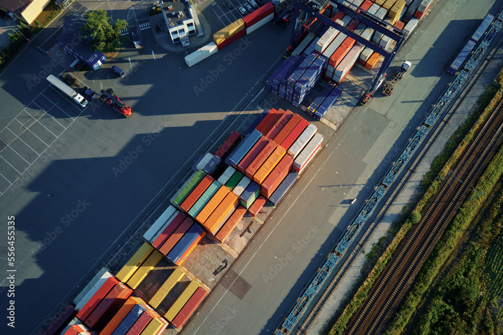 Shipping containers in terminal, Unloading containers in warehouse on ...