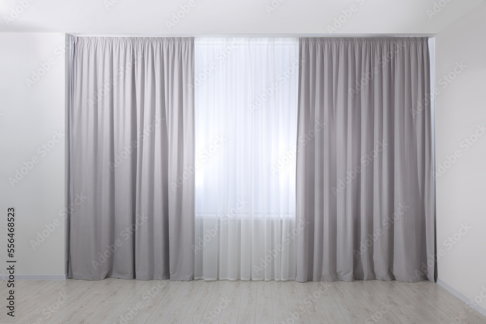 Light grey window curtains and white tulle indoors Stock Photo | Adobe ...