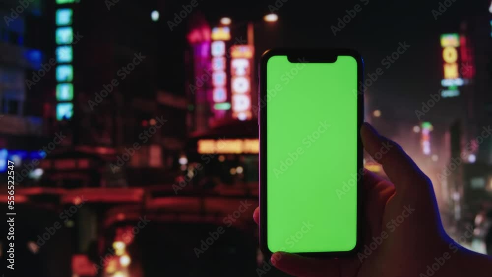 Smartphone with chroma key close-up. Mobile phone with green screen on ...