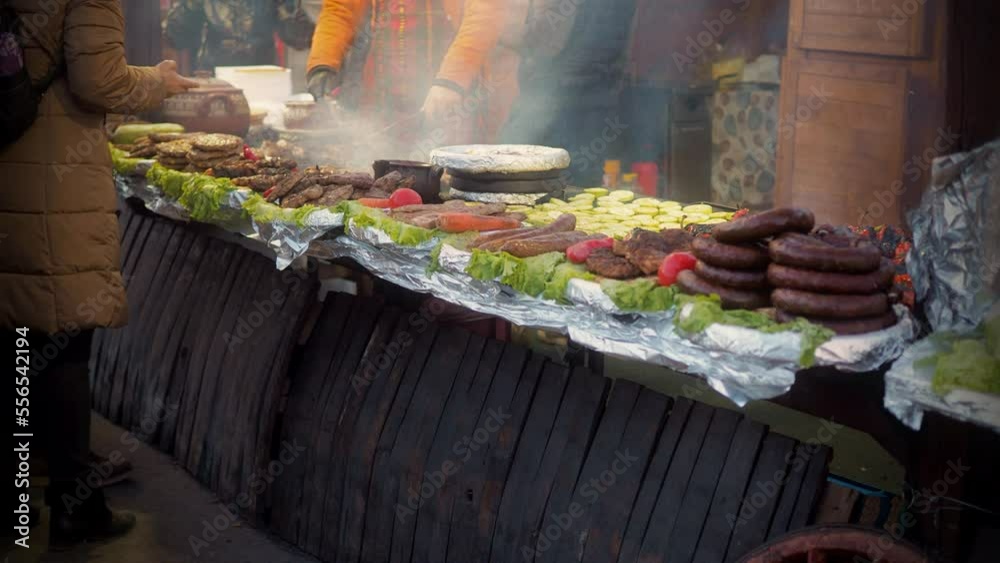 Balkan grill food fest. Grilled pork and chicken meat, lamb roasted on ...