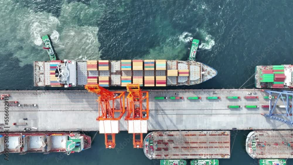 Tug boat drag pull Cargo Container Ship to international Bridge cargo ...