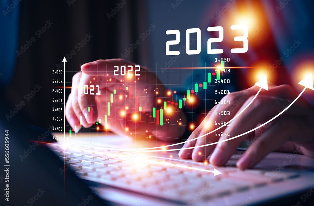 Businessman hand touching and pointing on year 2023 with virtual screen ...