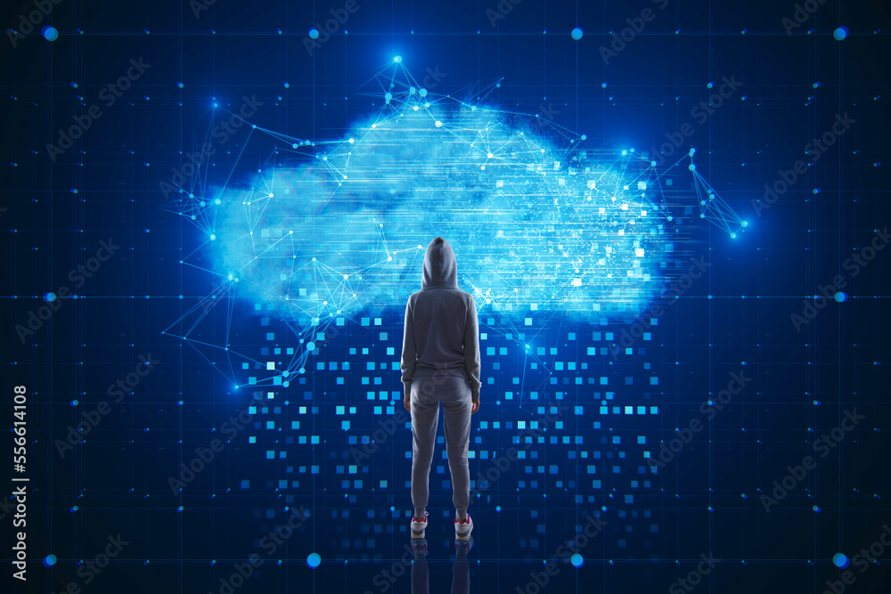Back view of hacker in hoodie using digital glowing polygonal cloud ...