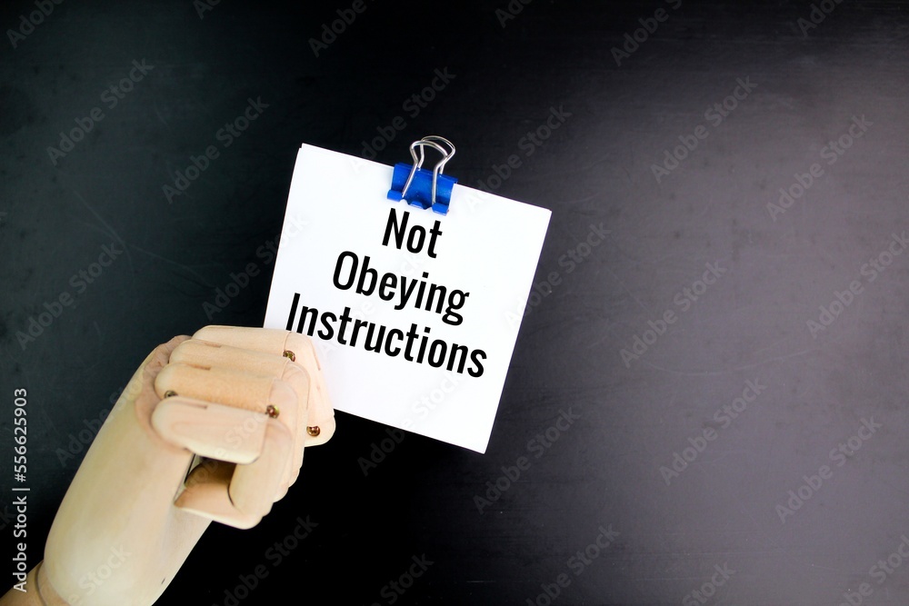 wooden hand holding a white paper with the words wooden hand holding a ...