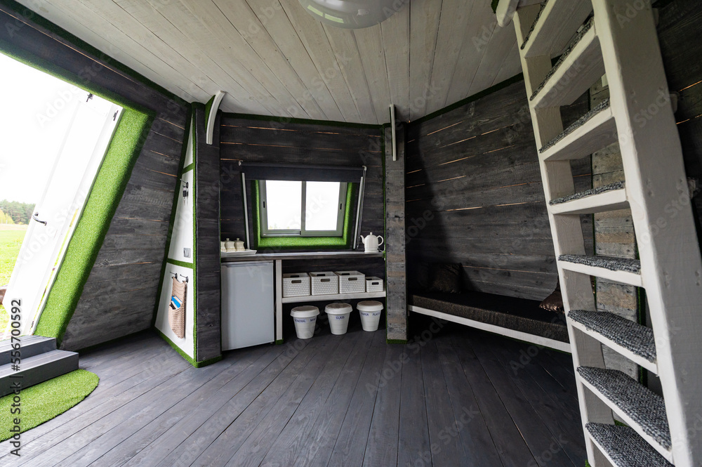 Foto de Wooden interior design. Living room of summer house. Pyramid ...