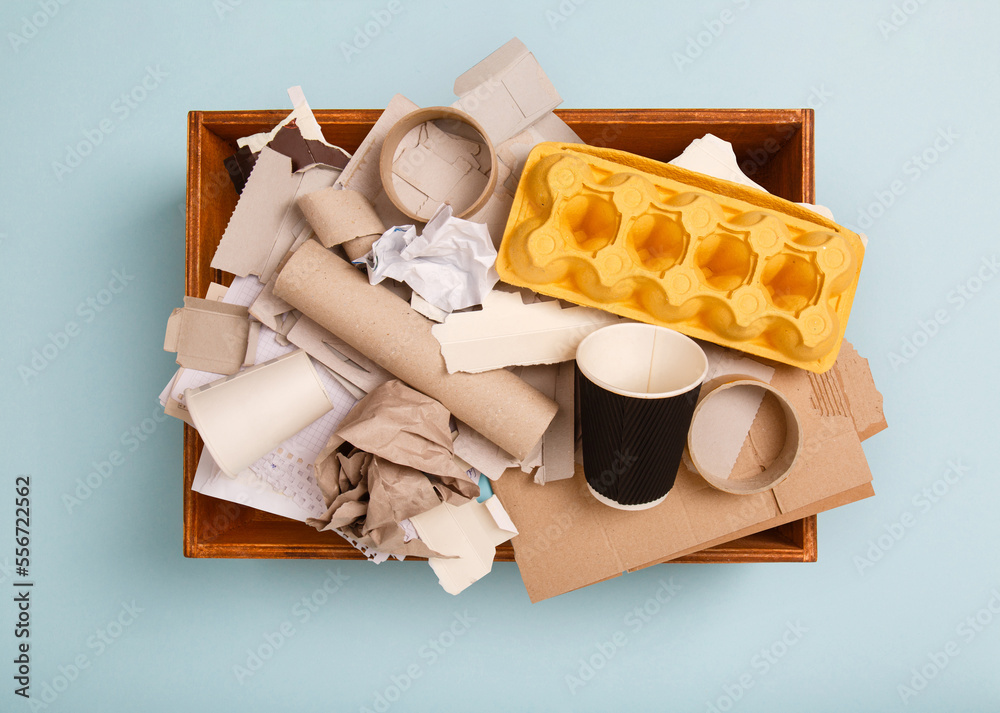 wooden box full of of paper garbage. top view. Stuff for recycle on ...