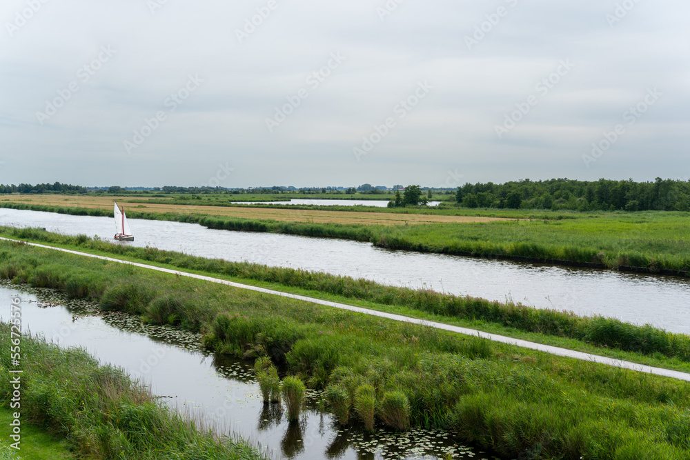 View over nature reserve and sail boat from Romsich (wideview) viewing ...