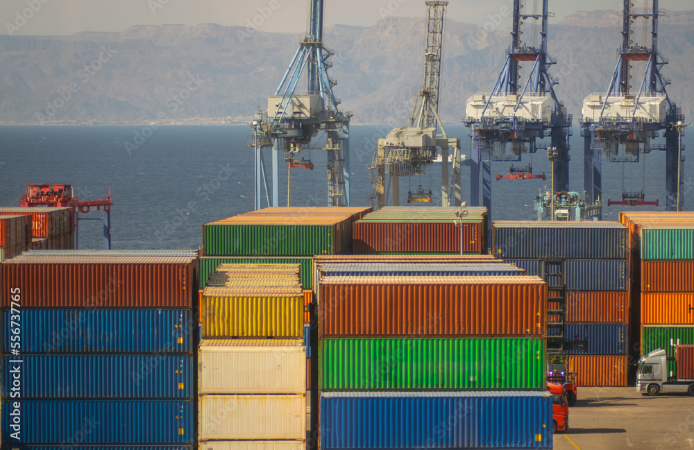 Shipyard full of shipping containers and cranes, trade logistics global ...