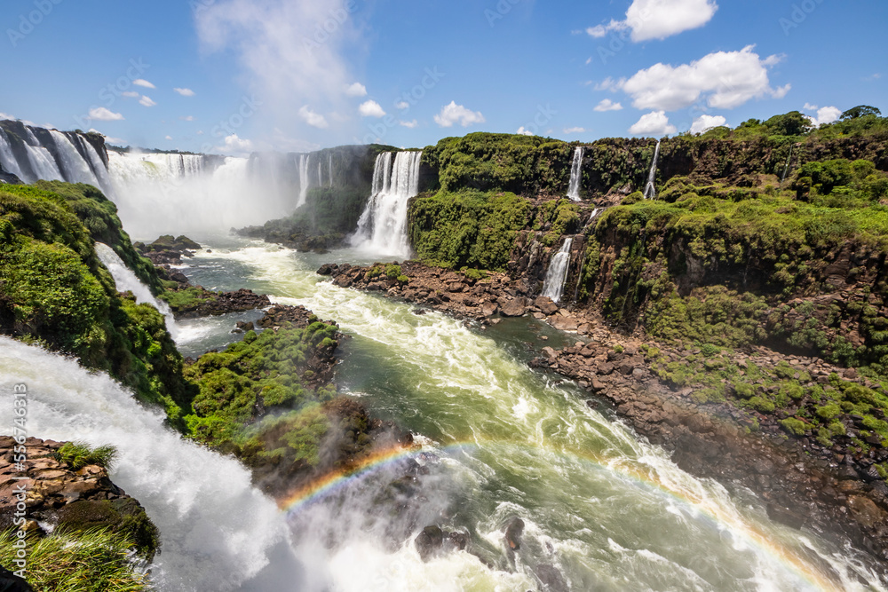 Lush foliage surrounding the waterfalls of Iguazu Falls; Foz do Iguacu ...