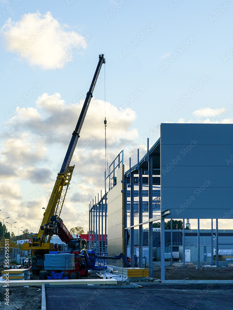 Sandwich panel wall assembly on an assembled steel frame of a new ...