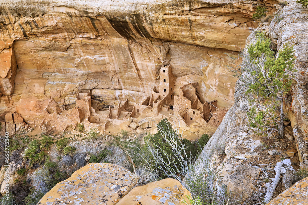 Square Tower House a stone structure carved into the adobe cliffs of ...