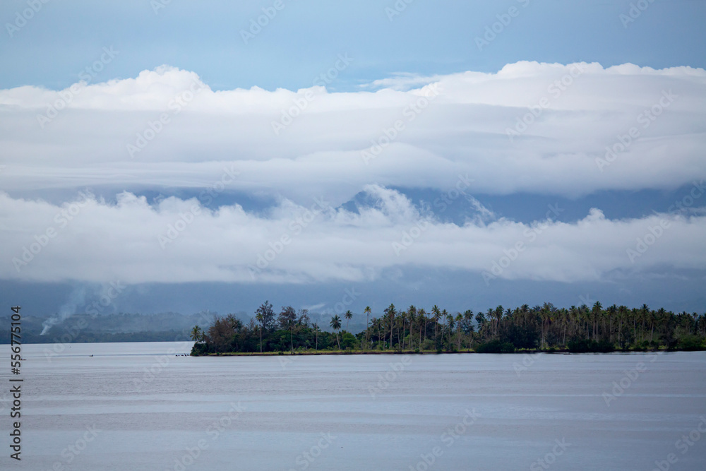 Mist over the island jungles of Dobu in the D'Entrecasteaux Islands ...