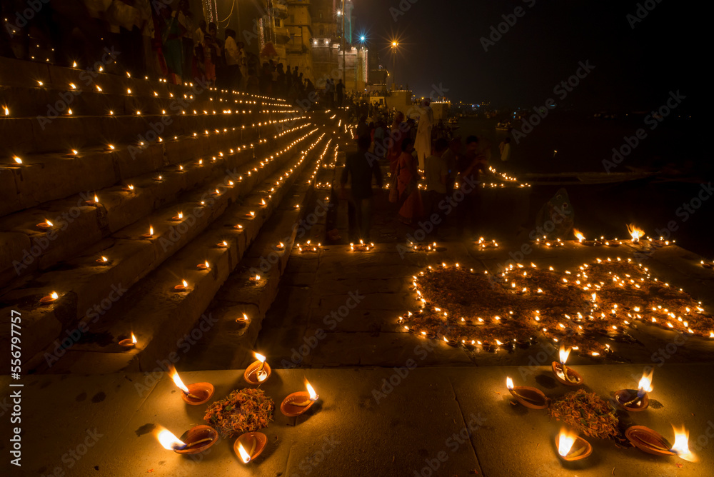 People gather at the ghats in Varanasi for Dev Deepawali with candles ...