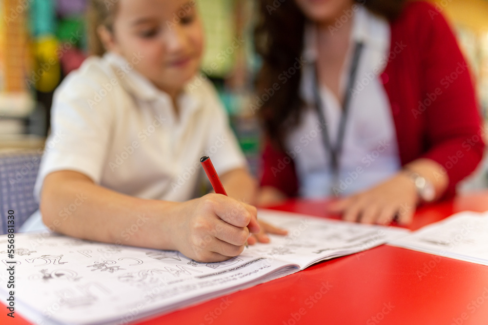 Student and Teacher Drawing Together Stock Photo | Adobe Stock